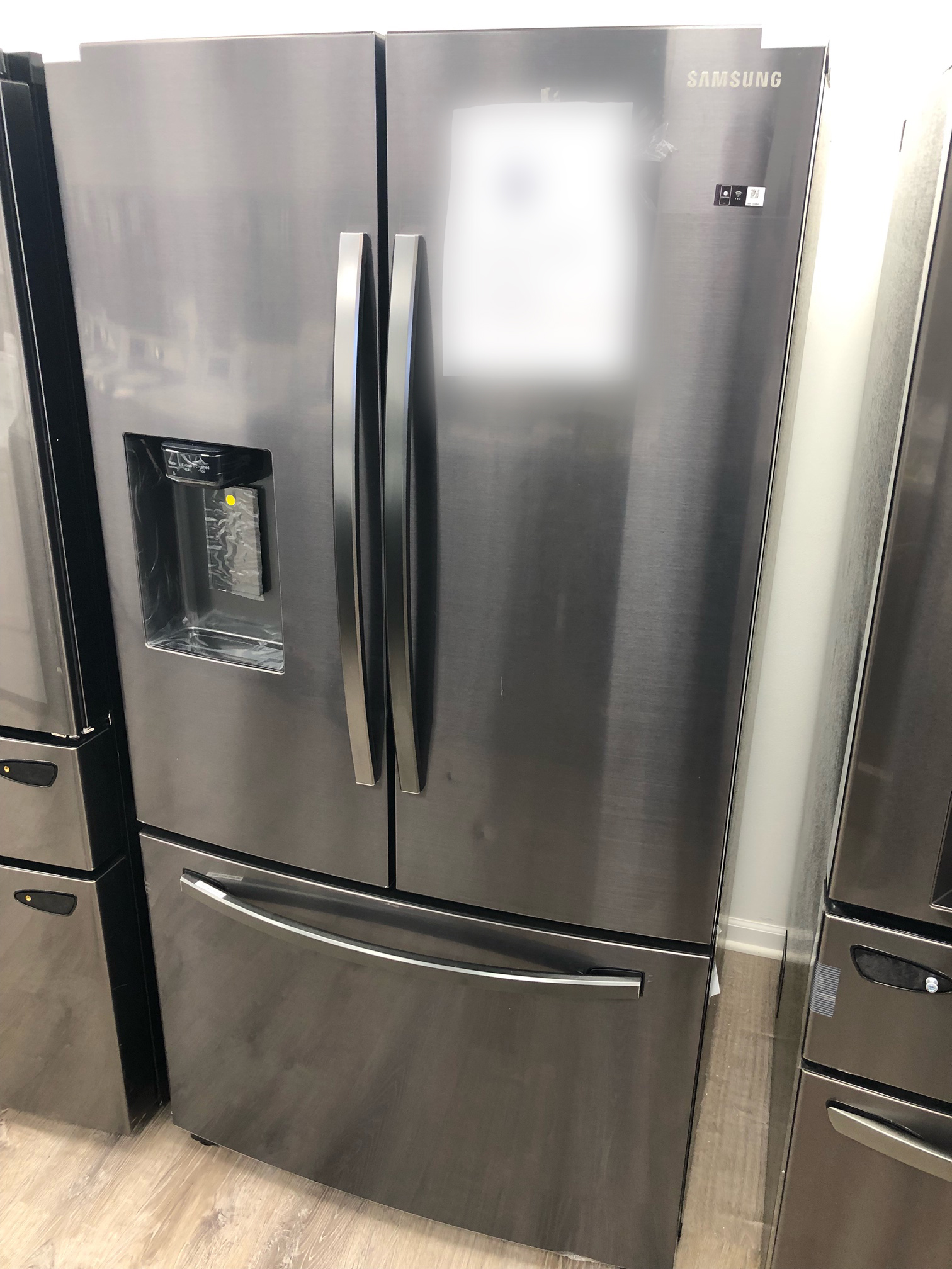 23 cu. ft. 3 Door French DoorCounter Depth Refrigerator with CoolSelect Pantry in Black Stainless Steel
